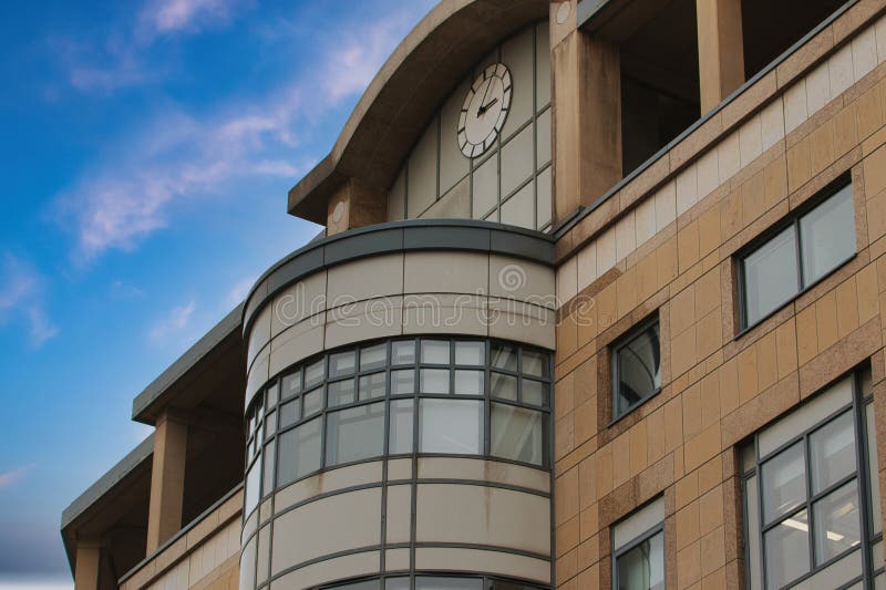 Curved Building with Clock and Windows in Hammersmith, London Stock ...