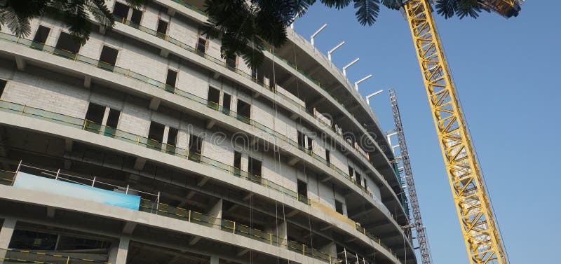 Curved Building Construcion Facade in Progress with Tall Crane Stock ...