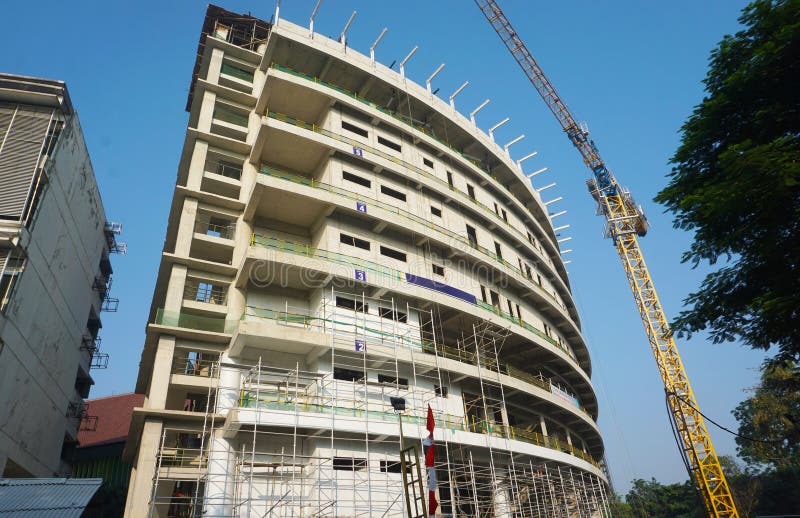 Curved Building Construcion Facade in Progress with Tall Crane Stock ...