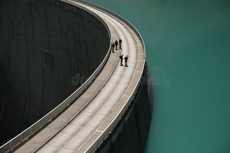 Curved concrete dam stock photo. Image of power, alps - 8101910