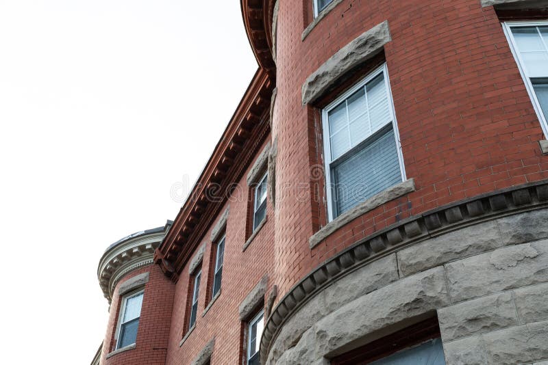 Curved and Flat Faces of an Old Urban Apartment Building Featuring ...