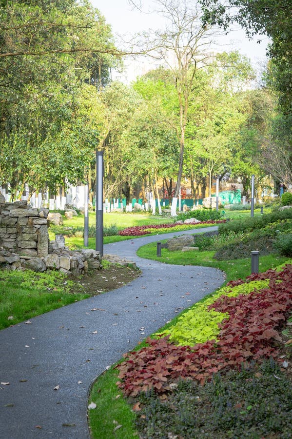 Curved garden path in park stock image. Image of direction - 312986965