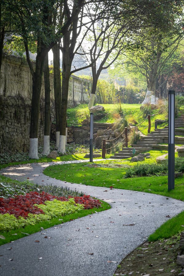 Curved garden path in park stock photo. Image of boulevard - 312986956