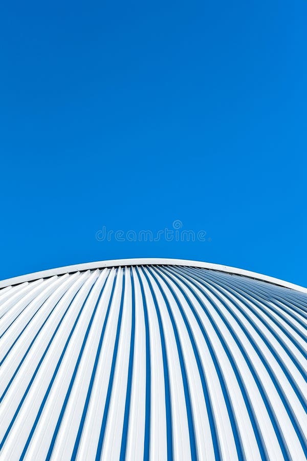 Curved Metal Architecture in White and Grey Tones Under a Clear Blue ...
