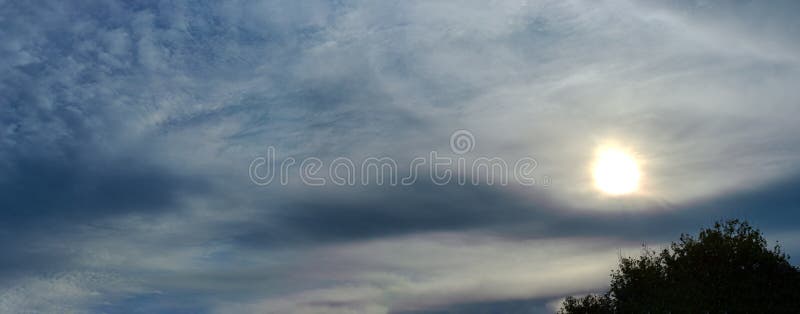 Curved Rain Stratus Clouds and Sun Stock Image - Image of dull, climate ...