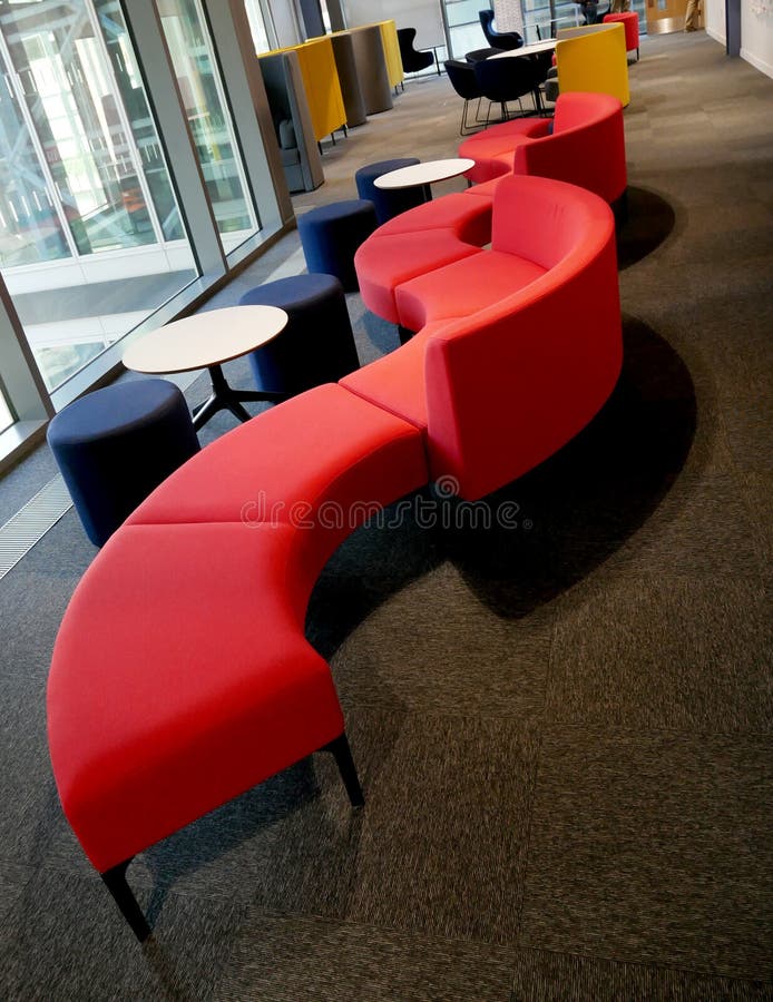 Curved Red Sofas and Blue Stools Stock Photo - Image of comfortable ...