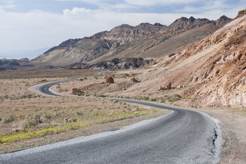 Curved road through desert stock photo. Image of highway - 14339790