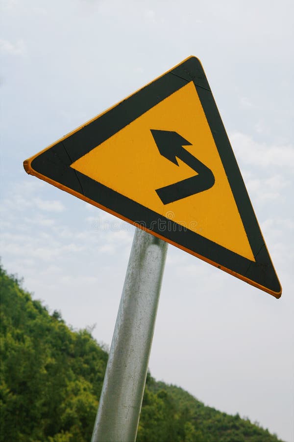 Curved Road Traffic Sign On Mountain Road Stock Photo - Image of slow ...