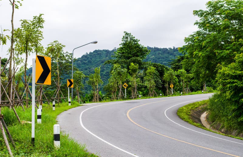 Curved road traffic sign stock photo. Image of signs - 44370928