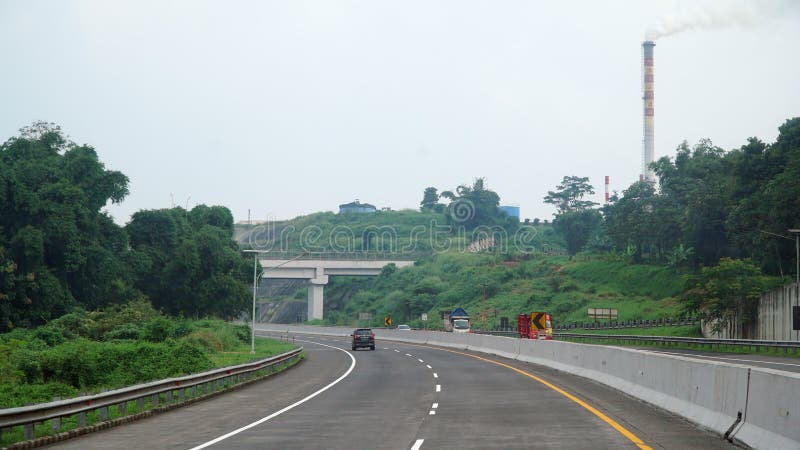The Curved Road of the Trans Java Toll Road during the Day, Factory ...