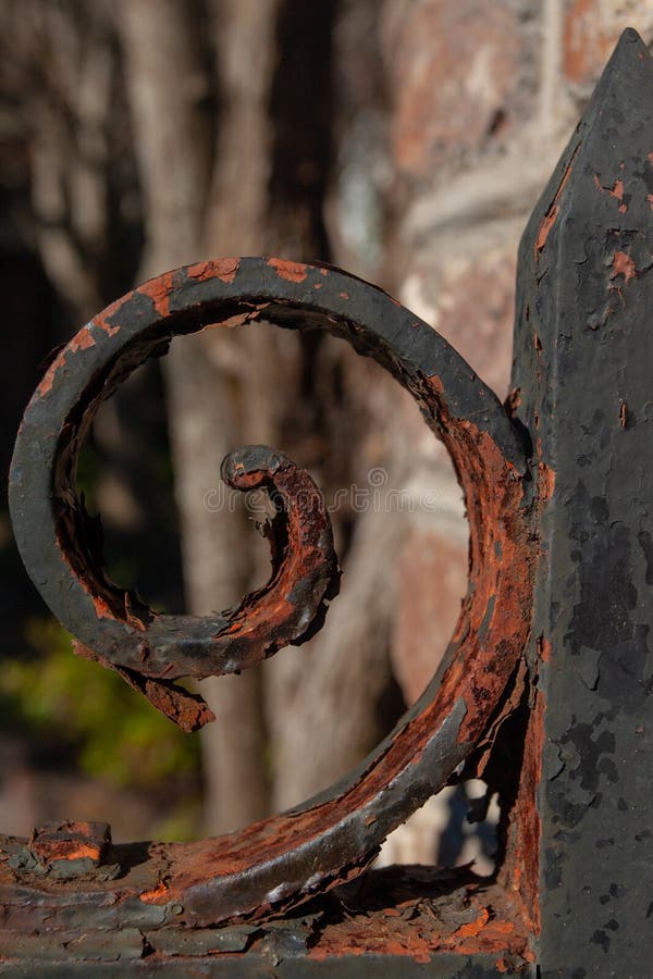 Curved Rusted Wrought Iron Post Stock Image - Image of metal, rust ...