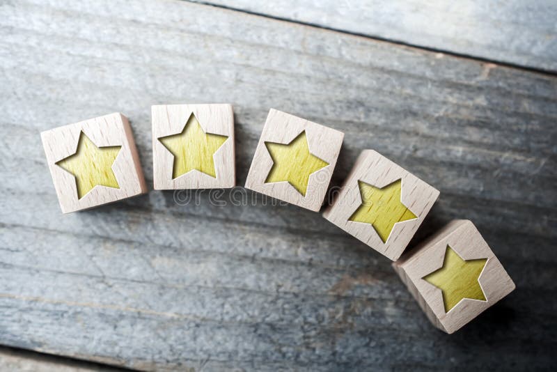 Curved 5 Star Ranking Formed by Wooden Blocks on a Board - Top ...