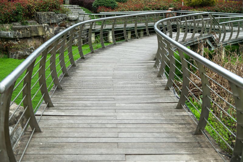 Curved Wood path stock image. Image of walk, green, wood - 311516127