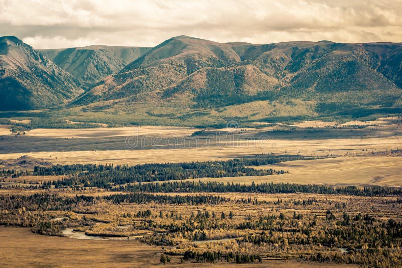 The Curves of the Ribbon of the River in a Mountain Valley Stock Image ...