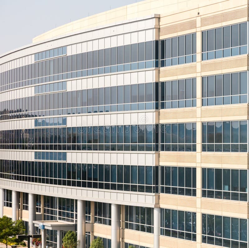 Curving Blue Glass Facade stock image. Image of window - 59486003
