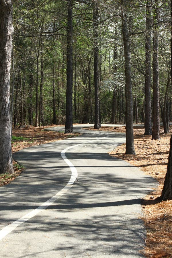 Curving path stock image. Image of shadows, paved, curving - 32293835