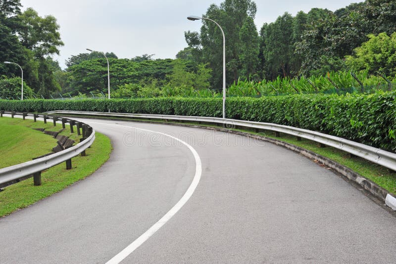 Curving Road stock photo. Image of lane, fence, curve - 18493078