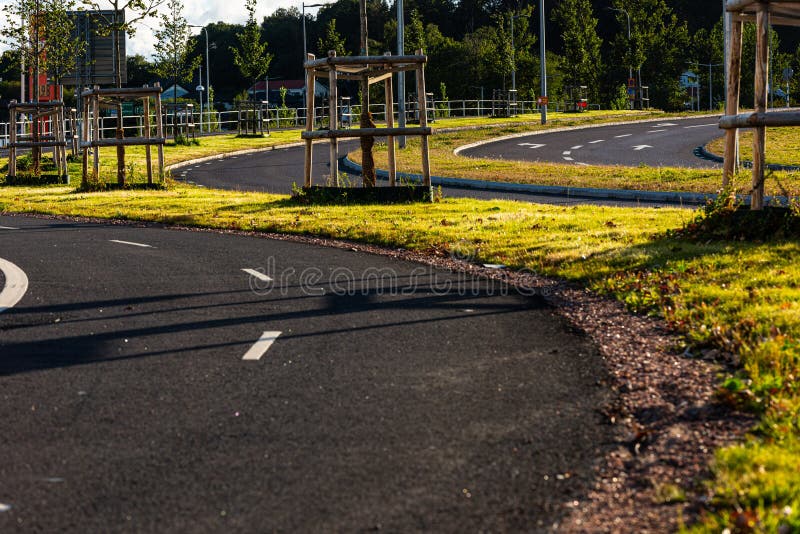 Curvy Bike and Walking Path Aling a Road Stock Photo - Image of person ...