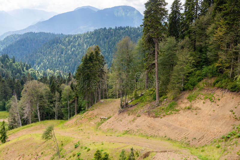 Curvy Dirt Road Down a Mountain Side or Slope Stock Photo - Image of ...