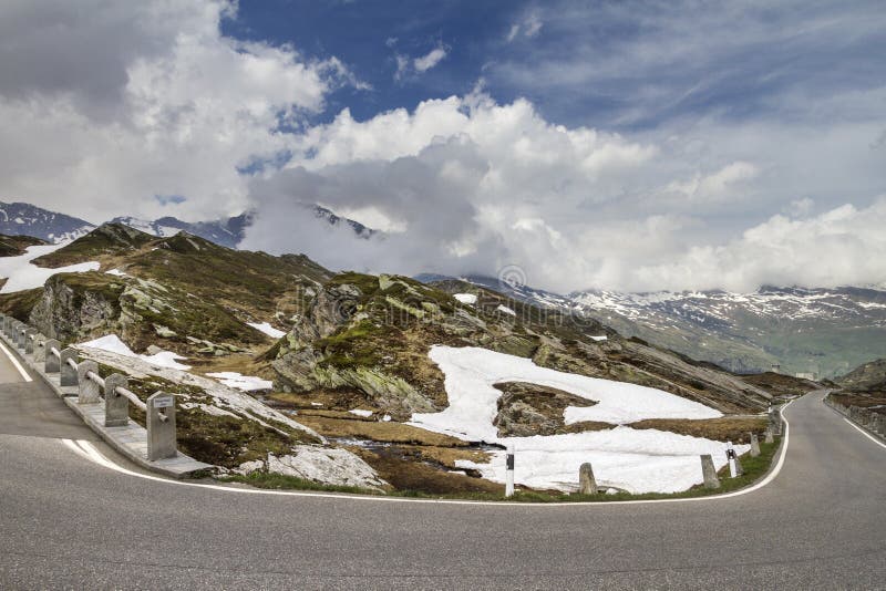 Curvy Paved Road Going through Beautiful Nature Scenes Under a Heavy ...