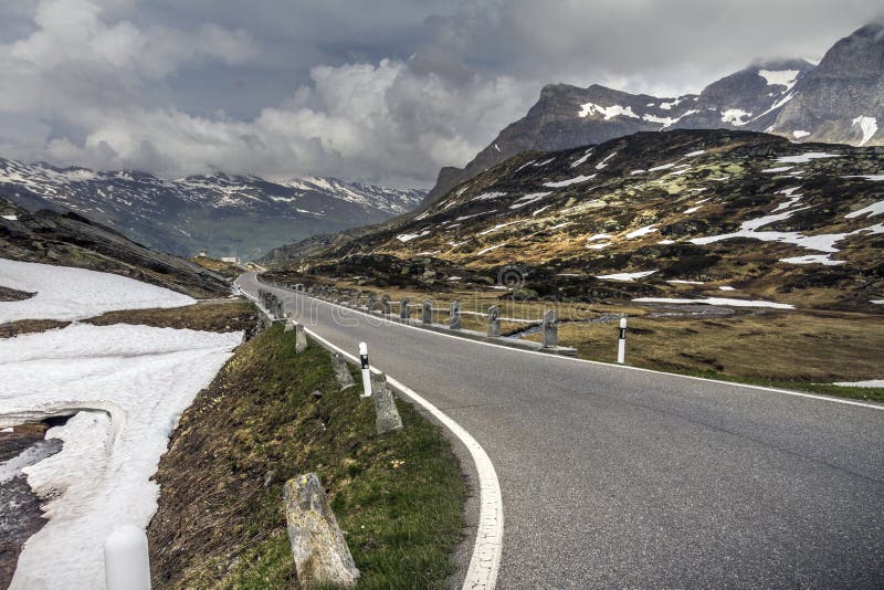 Curvy Paved Road Going through Beautiful Nature Scenes Under a Rainy ...