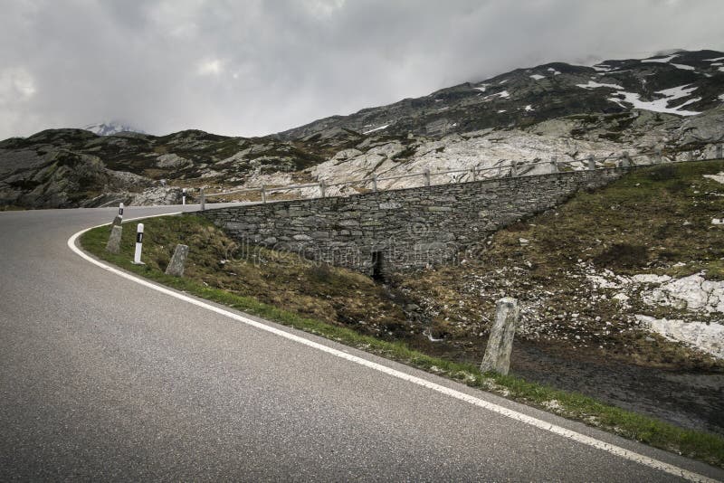 Curvy Paved Road Going through Beautiful Nature Scenes Under a Rainy ...