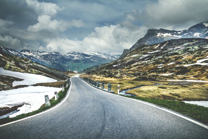 Curvy Paved Road Going through Beautiful Snow-cavered Nature Scenes ...