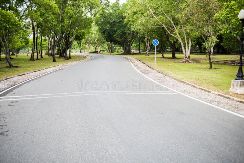 A Curvy Road of Fresh Green Stock Image - Image of arrow, symbol: 92008195