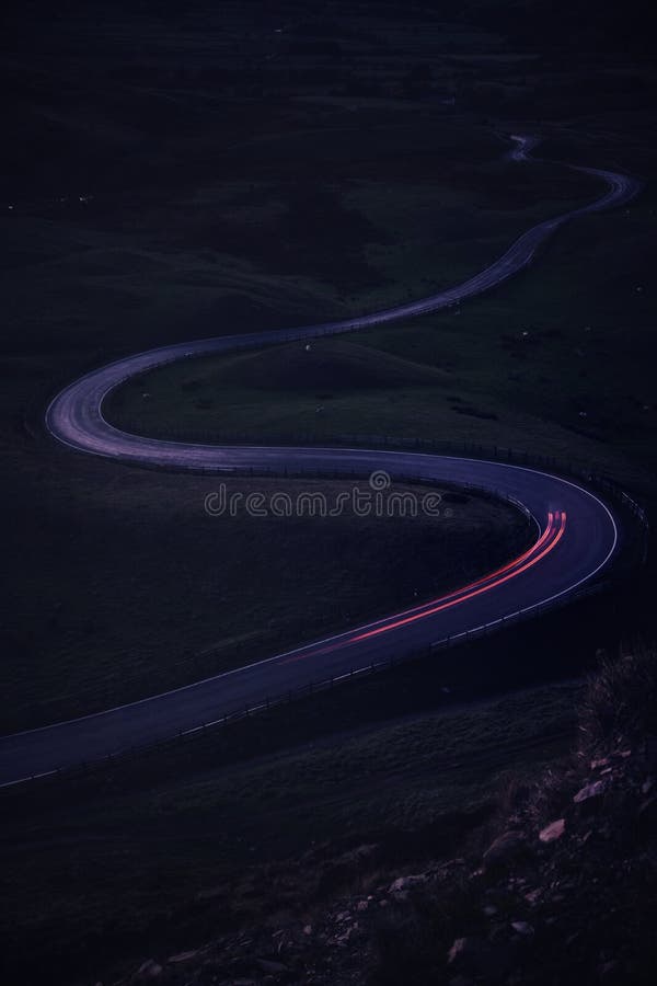 A Curvy Road View at Night Time. Stock Photo - Image of time, curvy ...