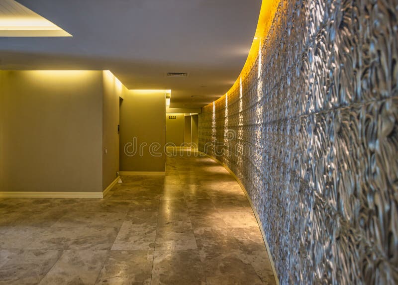 Curvy Wall, Warm Lightend Floor at a SPA Editorial Photography - Image ...
