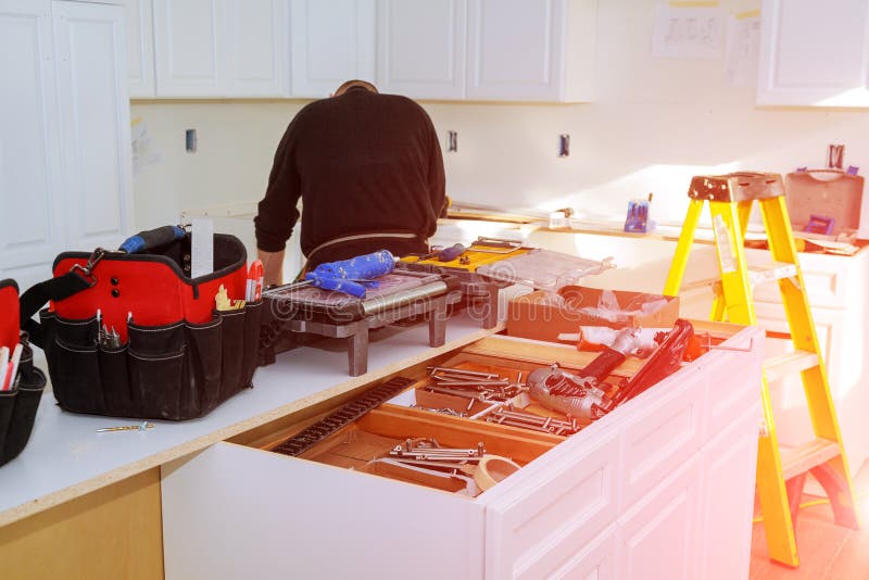 Custom Kitchen Cabinets in Various Stages of Installation Base Stock ...