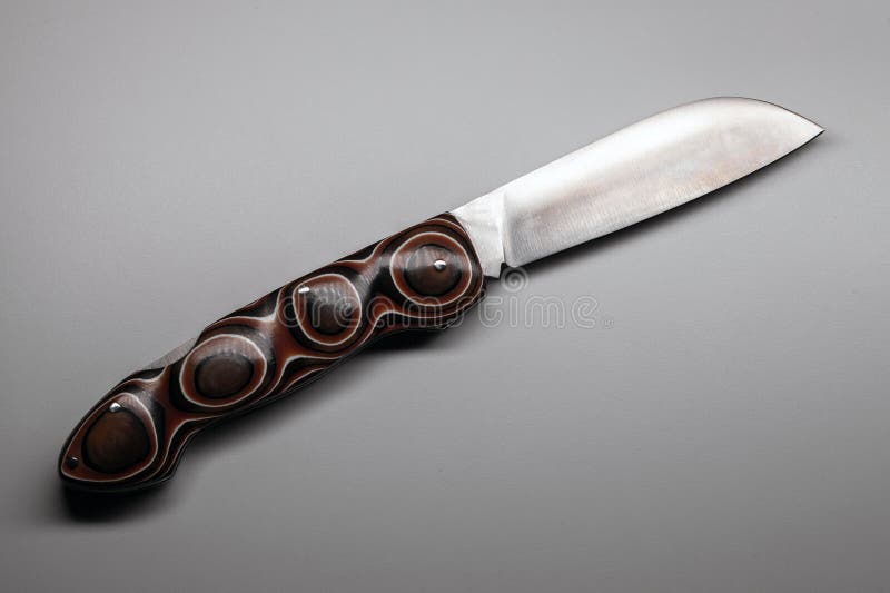 Custom Knife Featuring a Refined Blade and Artistic Handle Design Stock ...