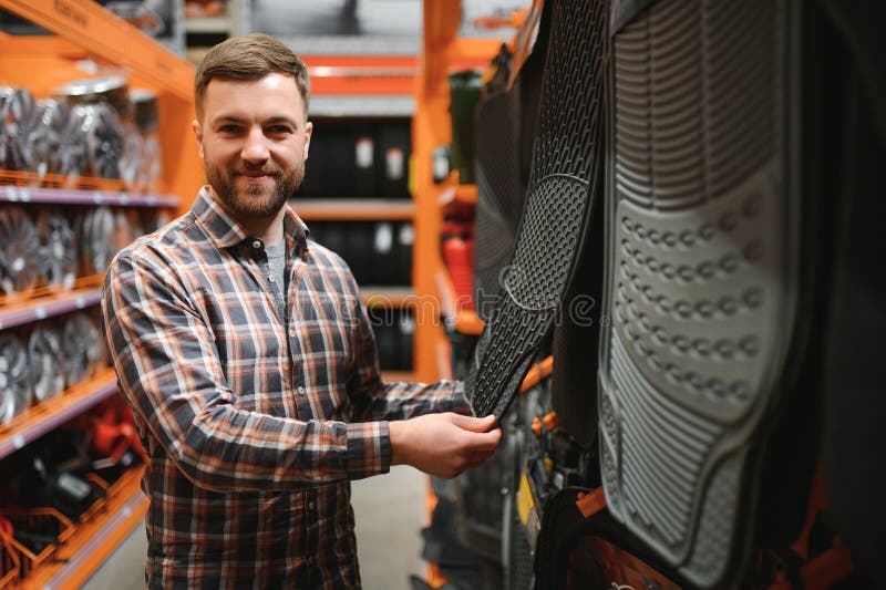 A Customer at an Auto Parts Store Stock Photo - Image of technician ...