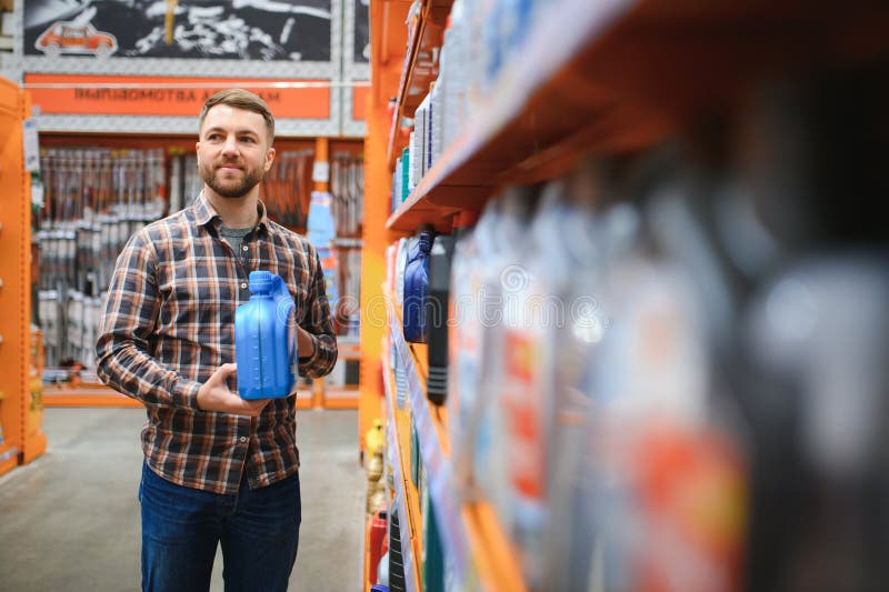 A Customer at an Auto Parts Store Stock Photo - Image of business ...
