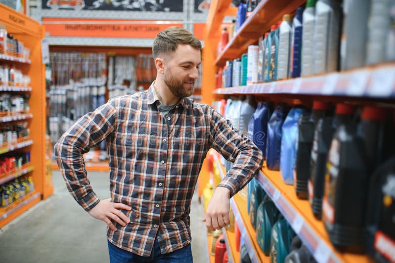 A Customer at an Auto Parts Store Stock Photo - Image of person, adult ...