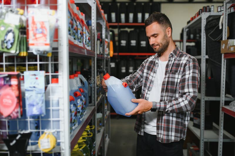 A Customer at an Auto Parts Store Stock Photo - Image of work, young ...