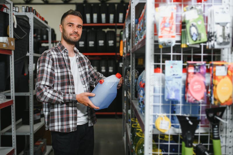 A Customer at an Auto Parts Store Stock Image - Image of garage, tire ...