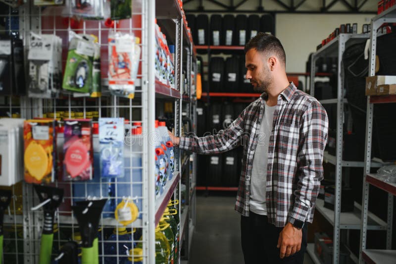 A Customer at an Auto Parts Store Stock Photo - Image of shopping ...
