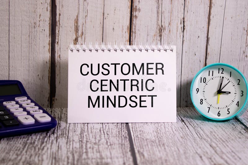 Customer Centric Mindset Write on a Book Isolated on Office Desk Stock ...