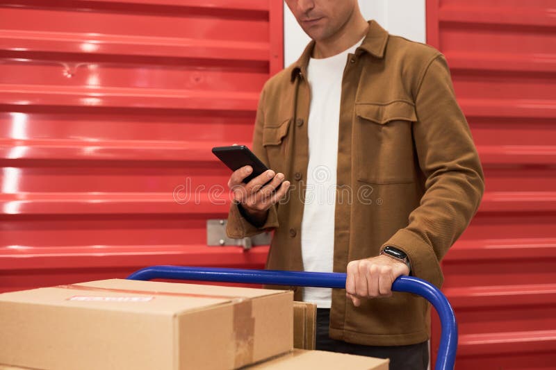 Customer Checking Message with Storage Unit Number Stock Photo - Image ...