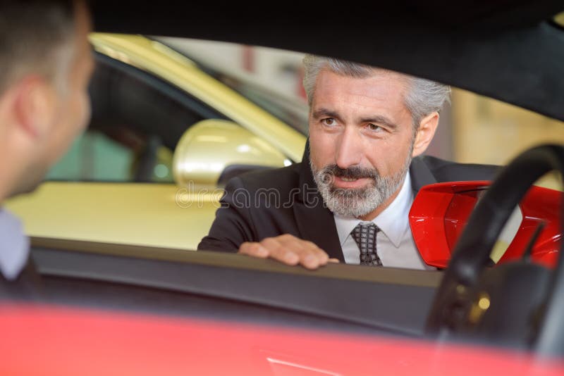 Customer Checking New Car from Inside Stock Image - Image of discussion ...