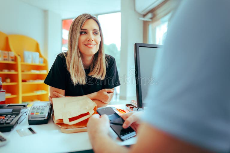 Customer Checking Out in a Store Using Electronic Payment Stock Image ...