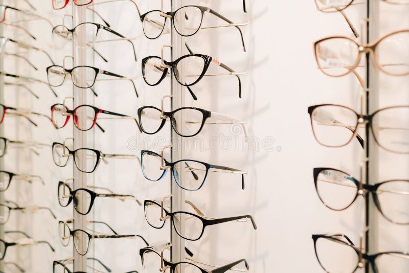 Customer Chooses Eyeglasses with Clear Lenses from the Shelf. Eyesight ...