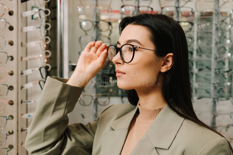 Customer Chooses Eyeglasses with Clear Lenses from the Shelf. Eyesight Correction Stock Photo ...