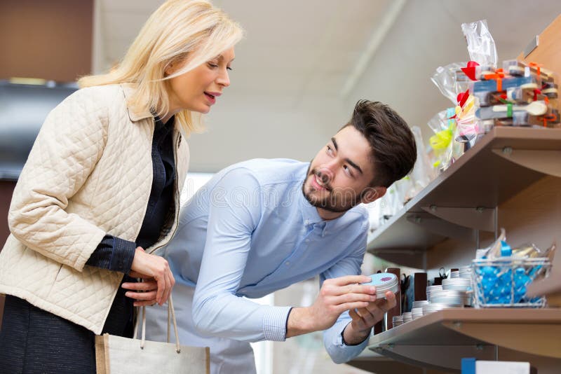 Customer Choosing Delicious Milk Chocolate from Shelf Stock Photo ...