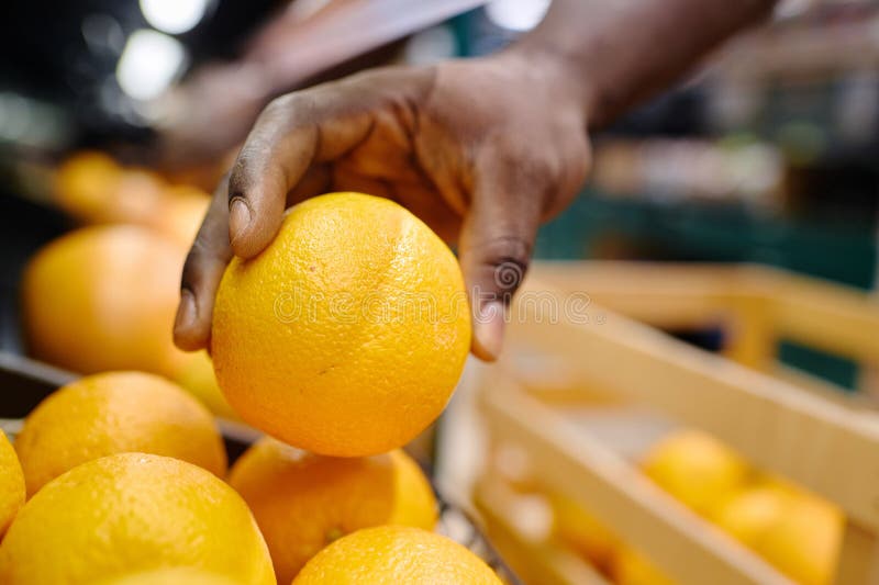 Customer Choosing Fresh Oranges in Store Stock Photo - Image of sale ...