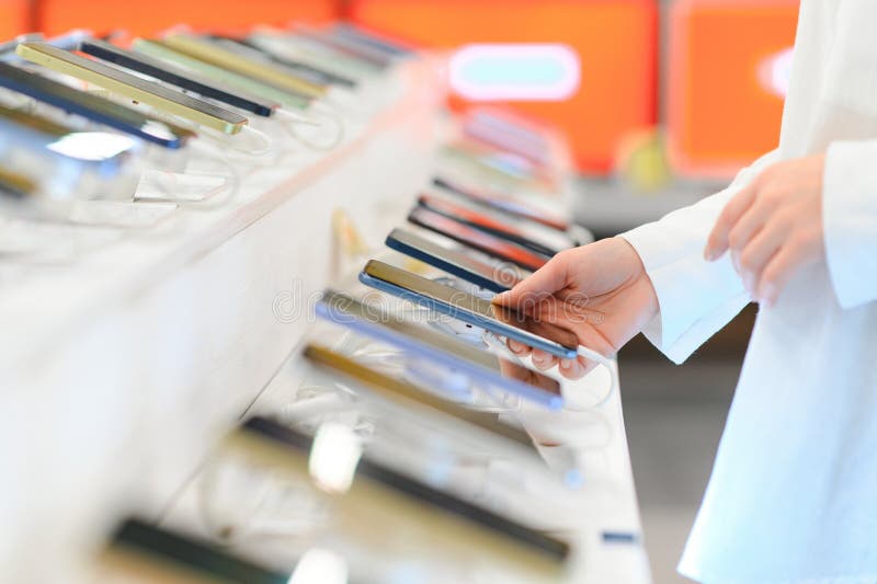 Customer Choosing a New Mobile Phone in a Shop Stock Image - Image of ...