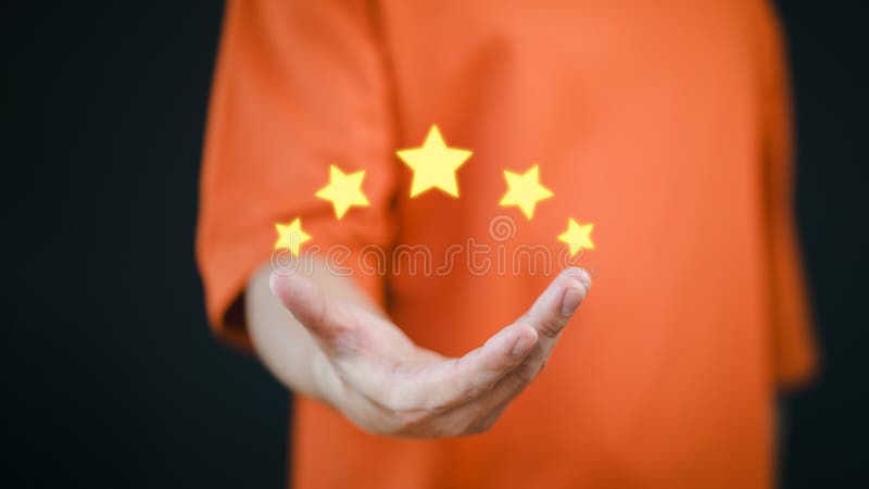 A Customer or Client S Hand Holds Stars To Complete a Five-star Rating ...