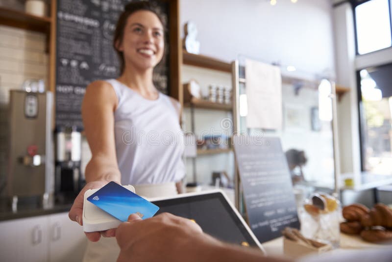 Customer at Coffee Shop Pays Smiling Waitress with Card Stock Photo ...