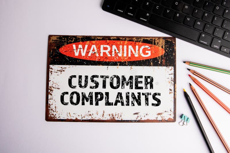 Customer Complaints Concept. Warning Sign and Computer Keyboard on ...